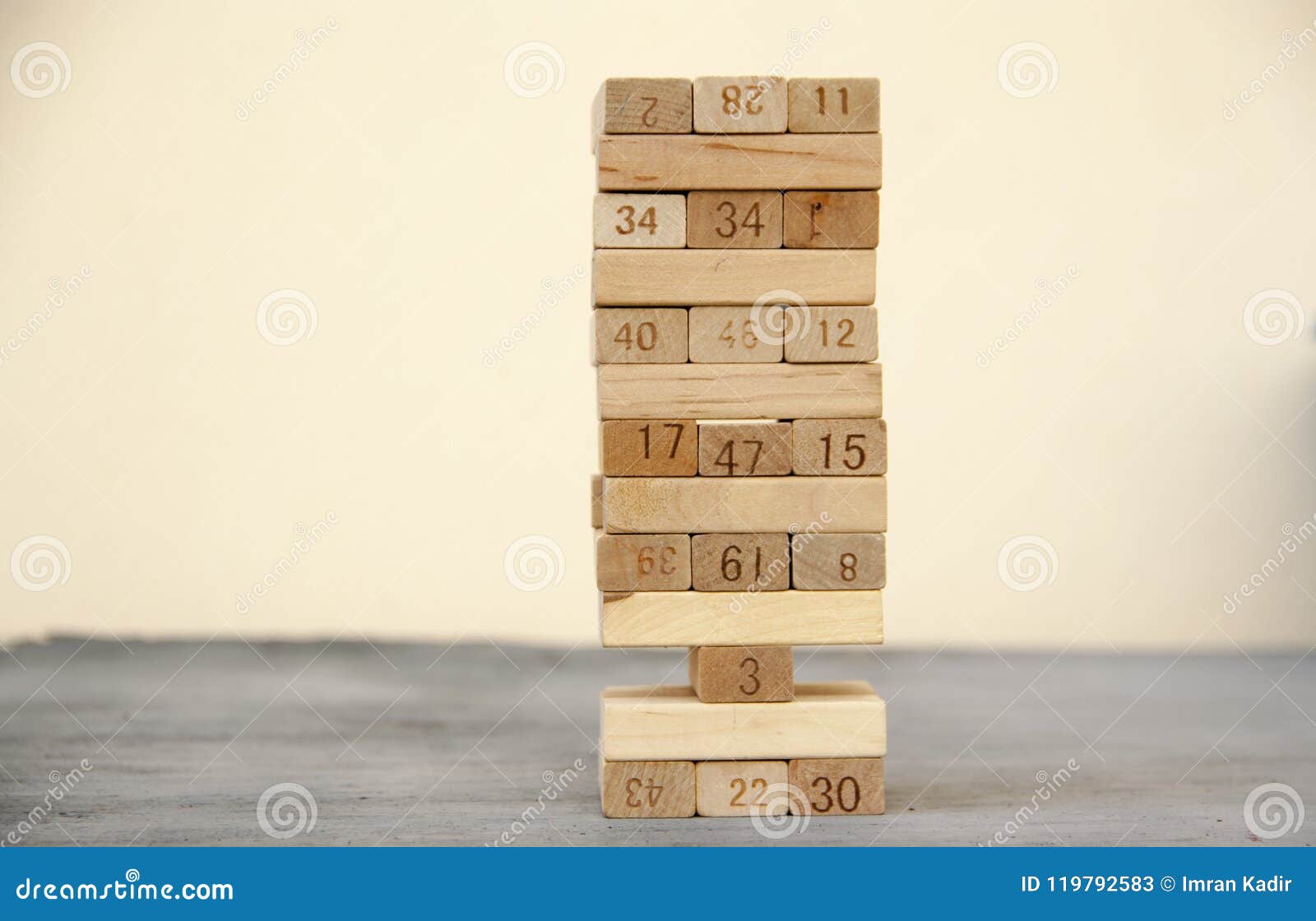 Arrange the wooden block stock image. Image of hand - 119792583