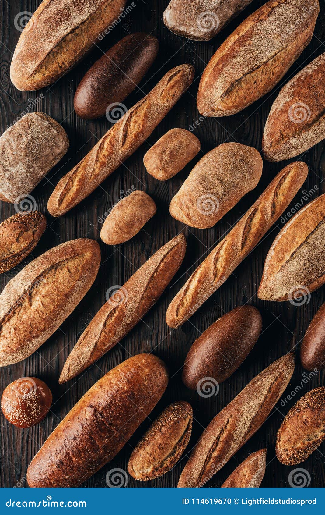 Arranged loafs of bread stock photo. Image of cookery - 114619670
