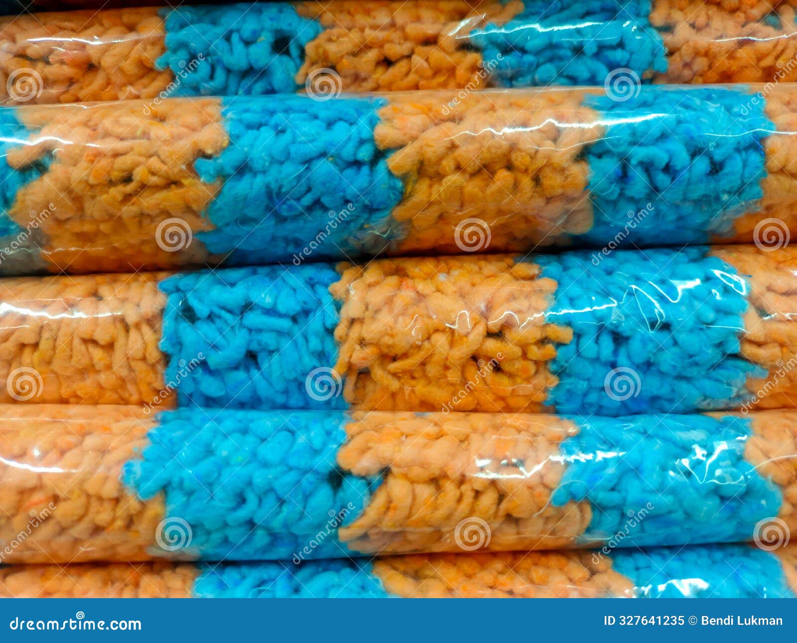Arrangement of Dusters in Plastic Wrap Stock Image - Image of ...