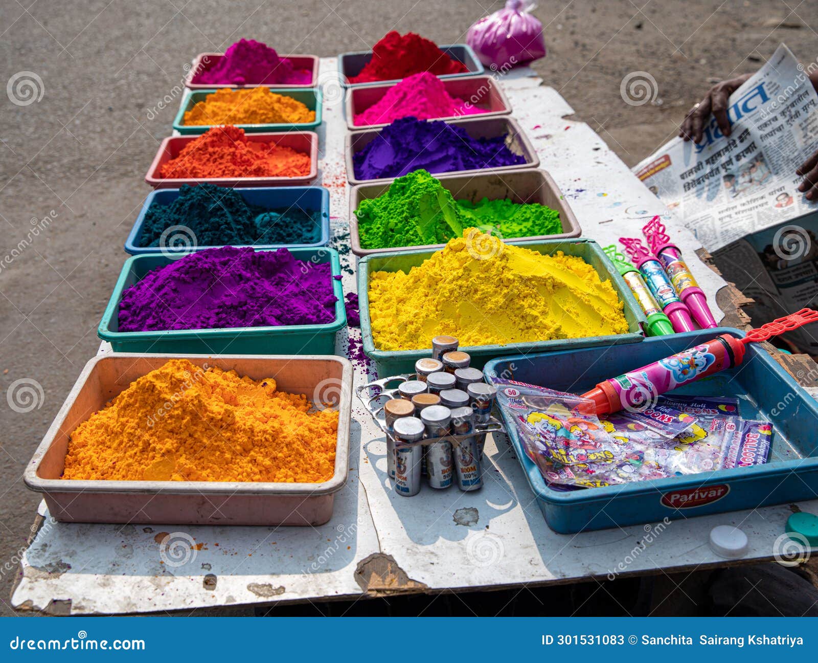 An Array of Bright, Colorful, Dry Holi Powders in Rectangular Plastic ...