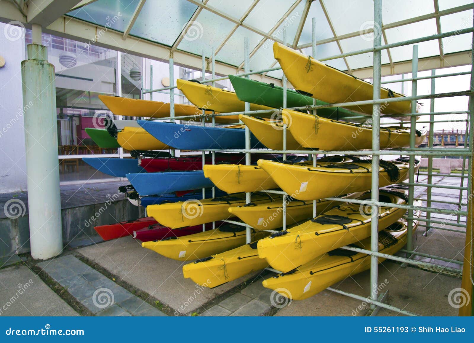 Array of color canoes stock image. Image of color, colorful - 55261193
