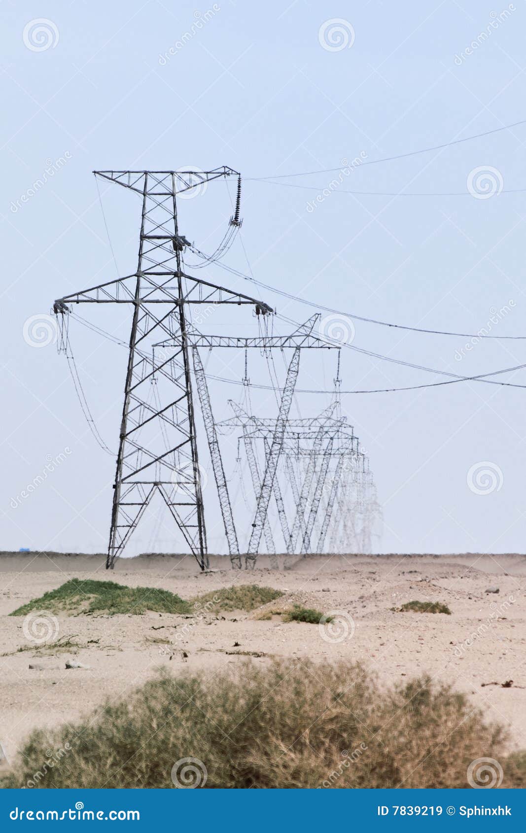 Array of Electric Pylons on a Clear Sky in Desert Stock Image - Image ...