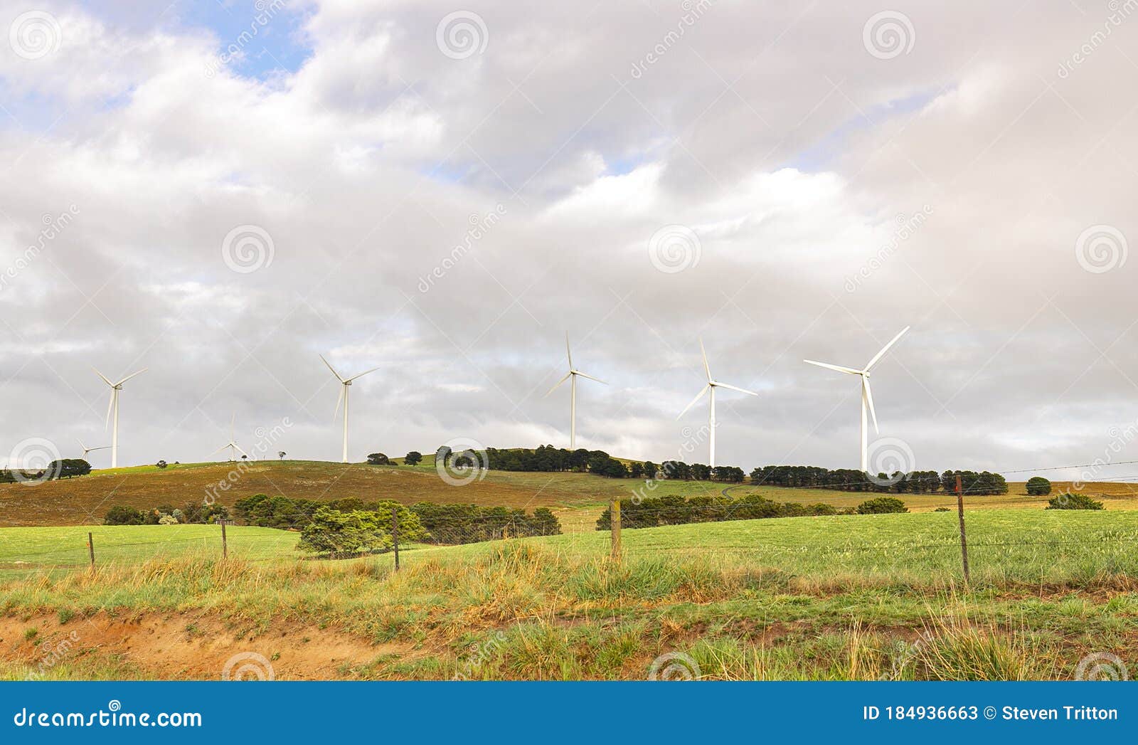 An Array of Large Wind Turbines Moving To Create Kinetic Energy for ...