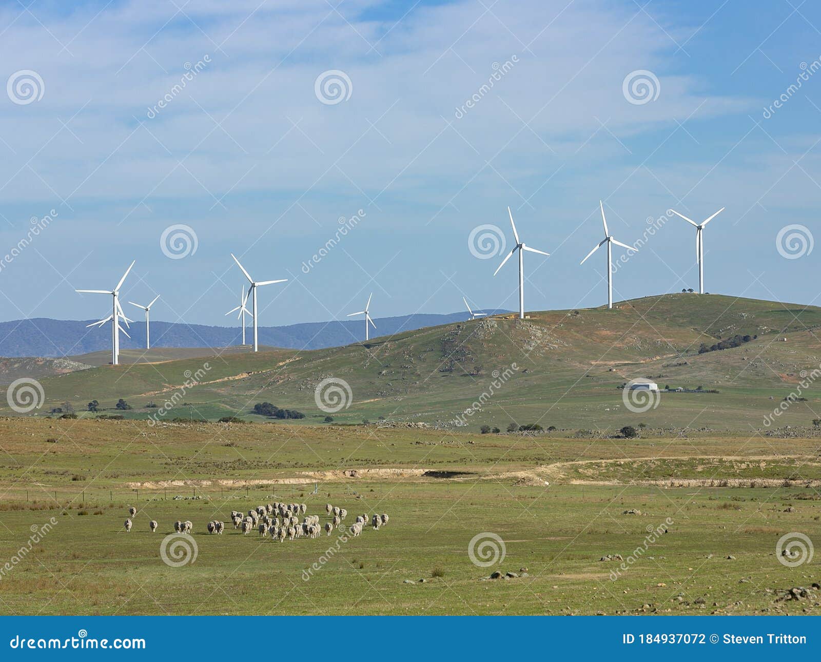 An Array of Large Wind Turbines Moving To Create Kinetic Energy for ...