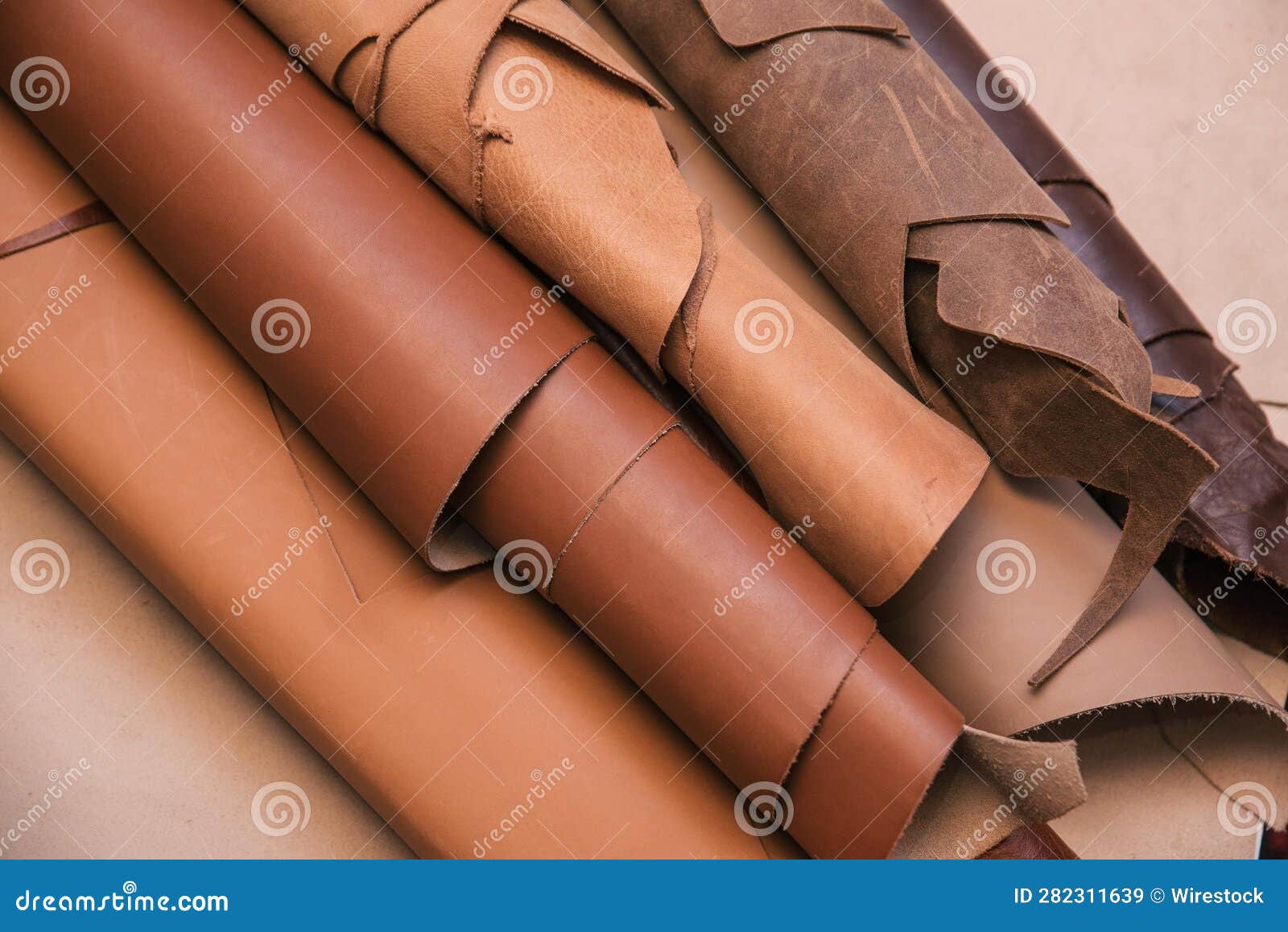 Array of Leather Fabric Samples in Different Shades Neatly Placed on a Table, Ready To Be ...
