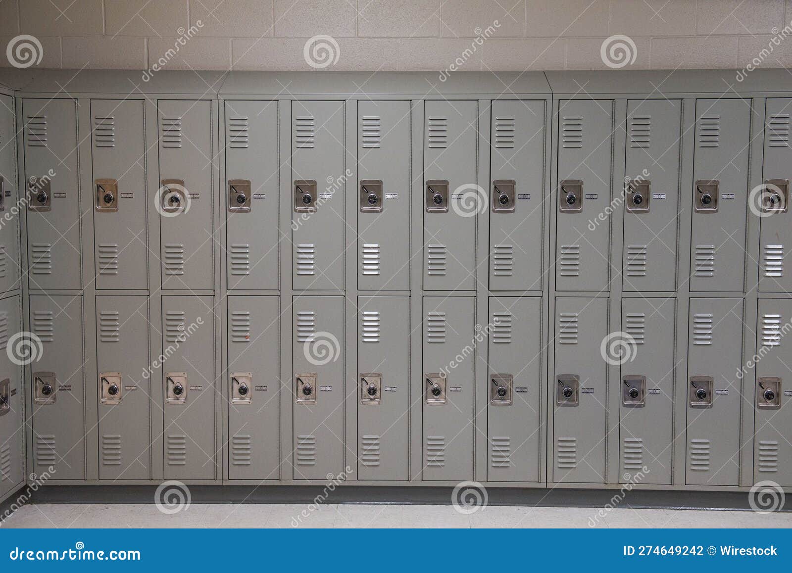 Array of Metal Lockers Arranged in a Row in Front of a Solid Wall Stock ...