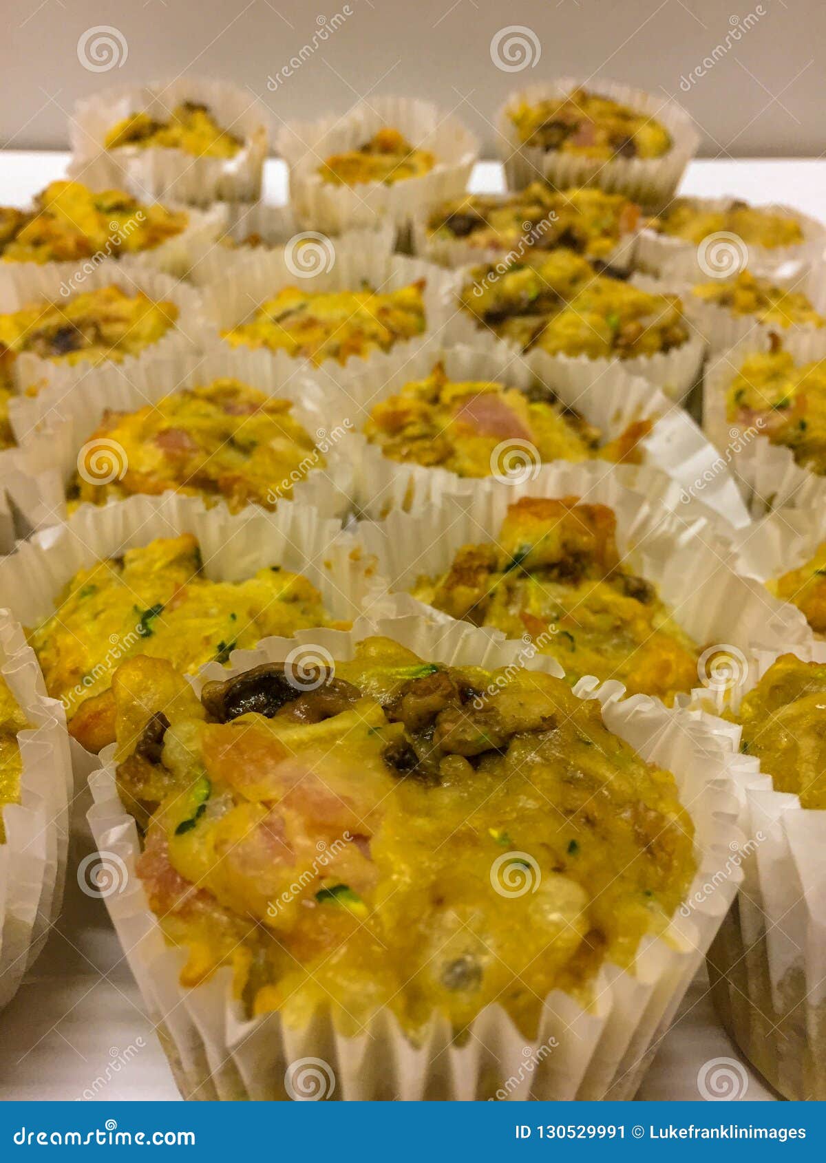 Array of savoury muffins stock image. Image of pastry - 130529991