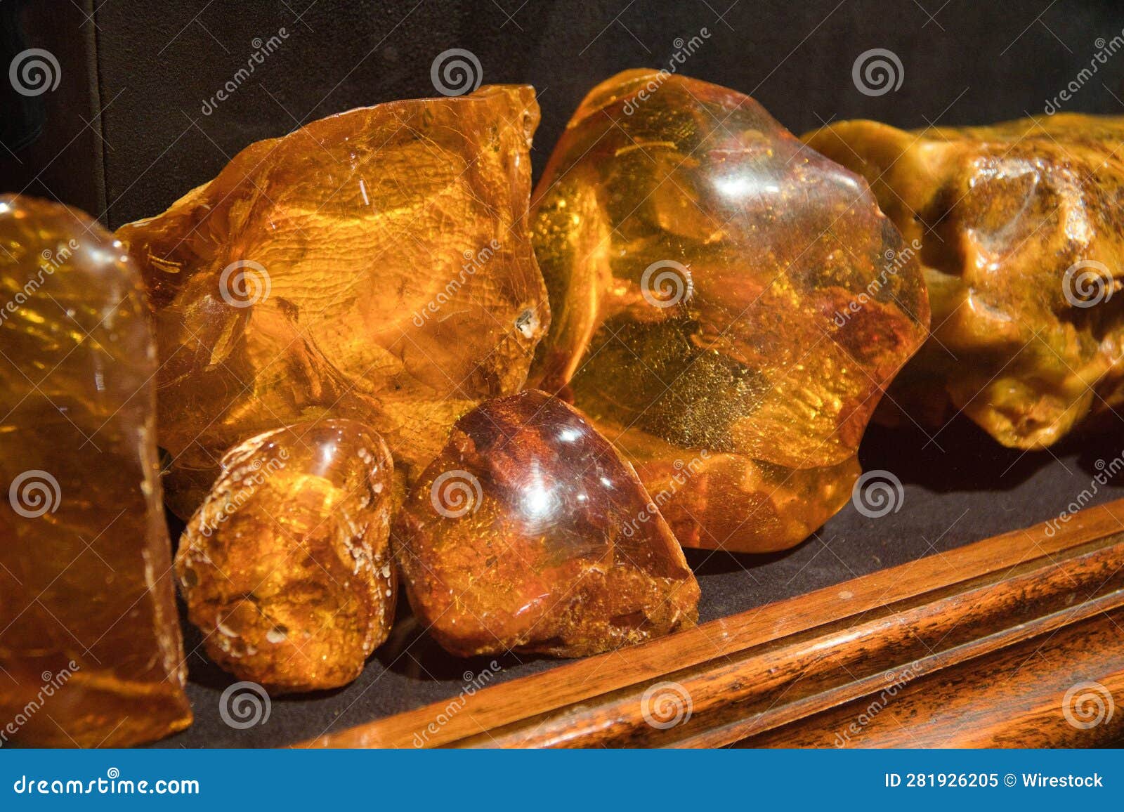 Array of Smooth Kauri Amber Stones on Display. Stock Image - Image of ...