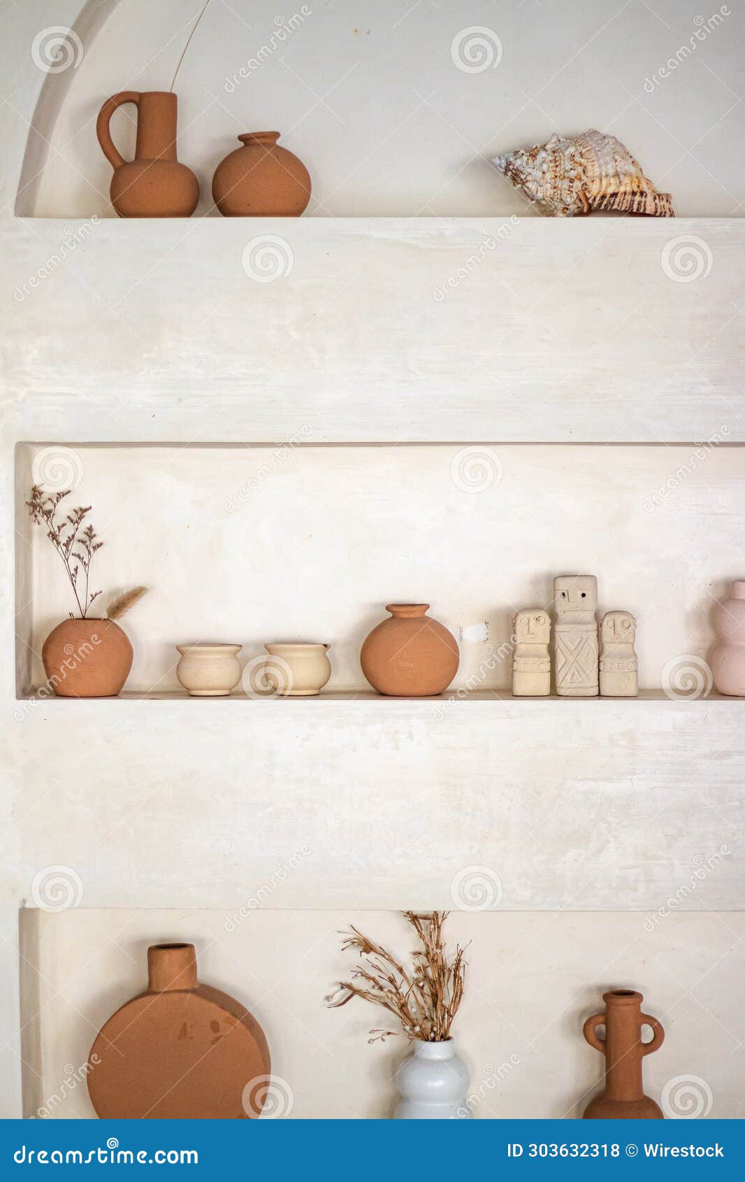 Array of Various Clay Pots and Other Artifacts Placed on Mediterranean ...