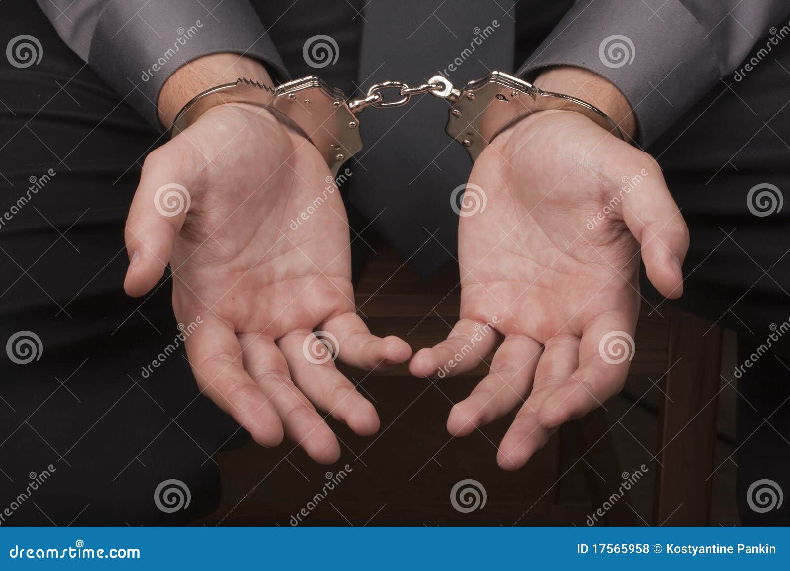 Arrest handcuffs stock photo. Image of sequester, hand - 17565958