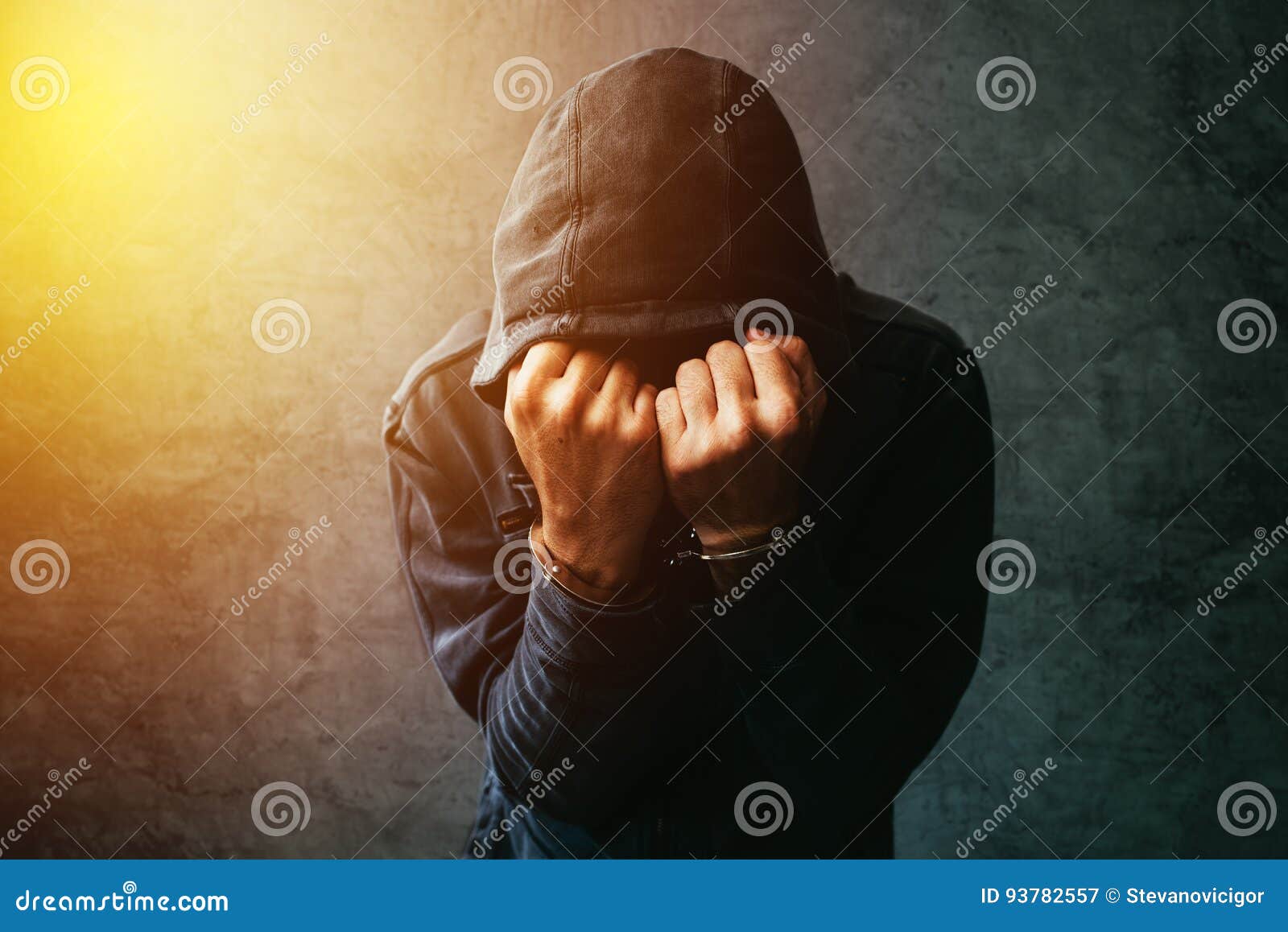 Arrested Computer Hacker with Handcuffs Wearing Hooded Jacket Stock ...