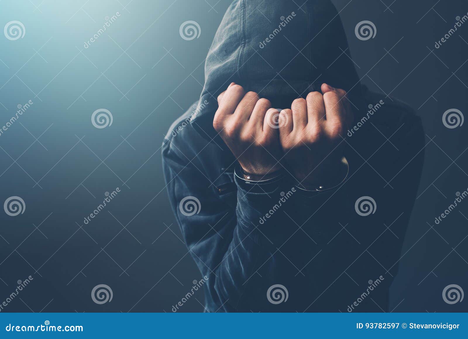 Arrested Computer Hacker with Handcuffs Wearing Hooded Jacket Stock ...