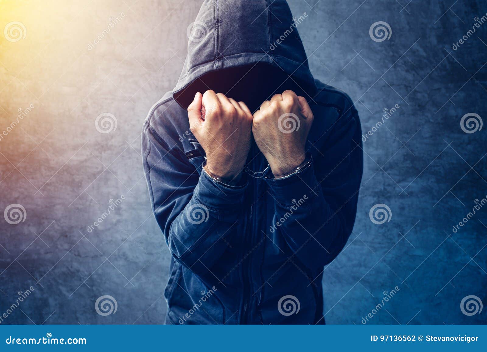 Arrested Computer Hacker with Handcuffs Wearing Hooded Jacket Stock ...