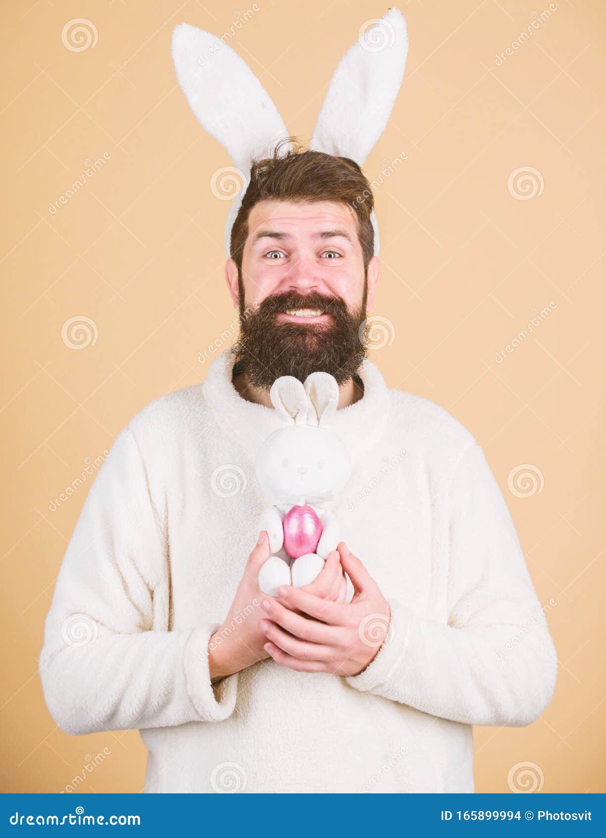 The Arrival of Spring. Bearded Man with Bunny Toy and Easter Egg ...