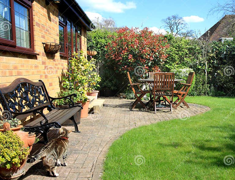Arrival of Spring in an English Garden Stock Image - Image of planters ...
