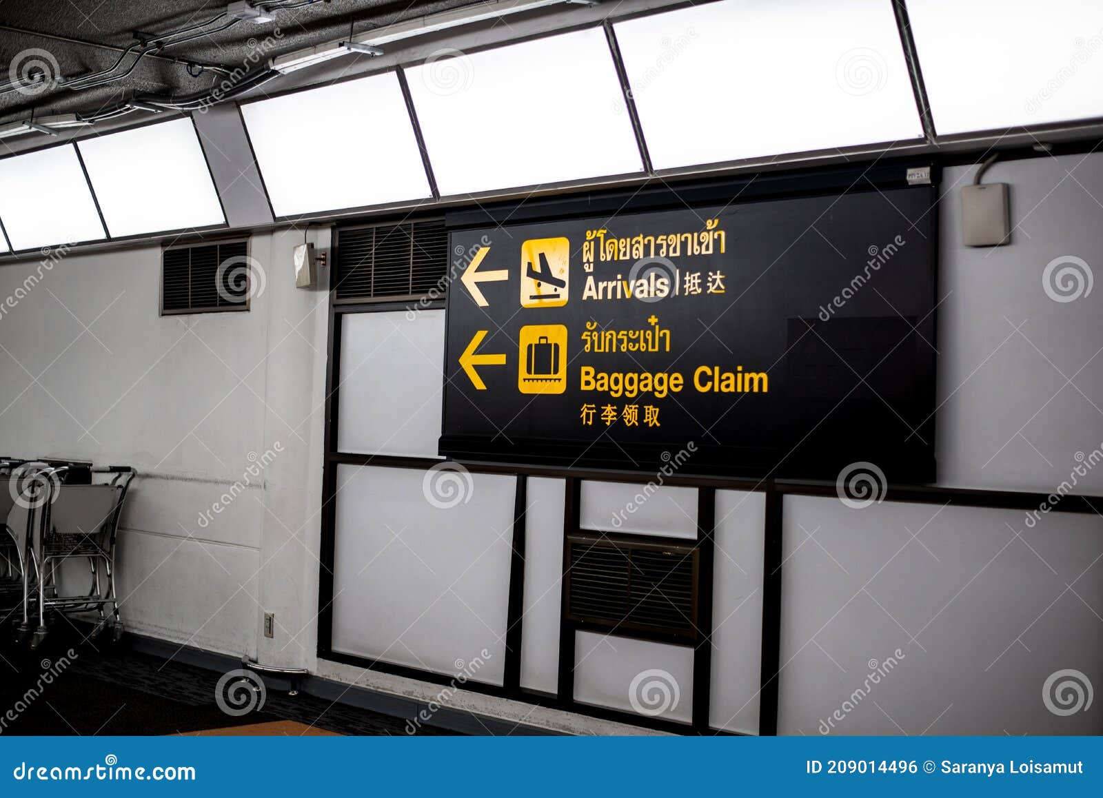 Arrivals Signs and Baggage Claim in Airport Stock Photo - Image of ...