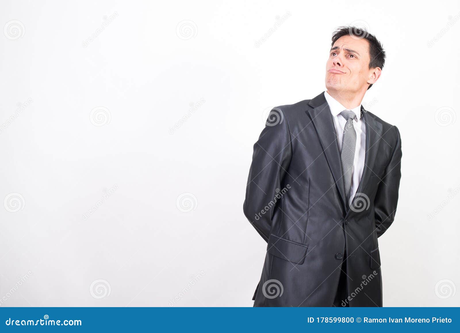Arrogant man in suit stock photo. Image of background - 178599800
