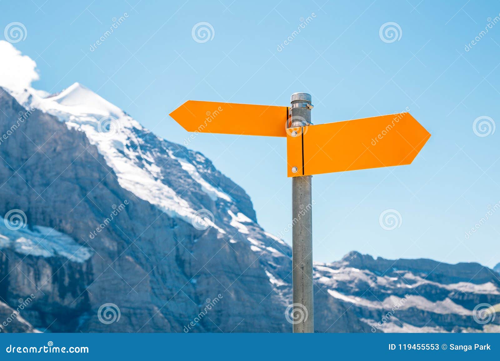 Arrow Direction Sign with Snowy Mountain Stock Image - Image of ...