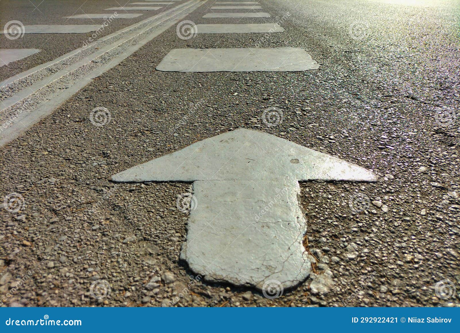 An Arrow on the Footpath Indicating, Controlling the Direction of ...
