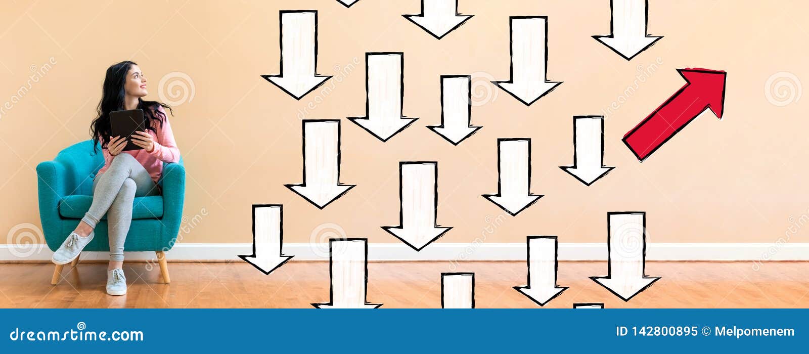 Arrow Going in a Different Direction with Woman Using a Tablet Stock ...