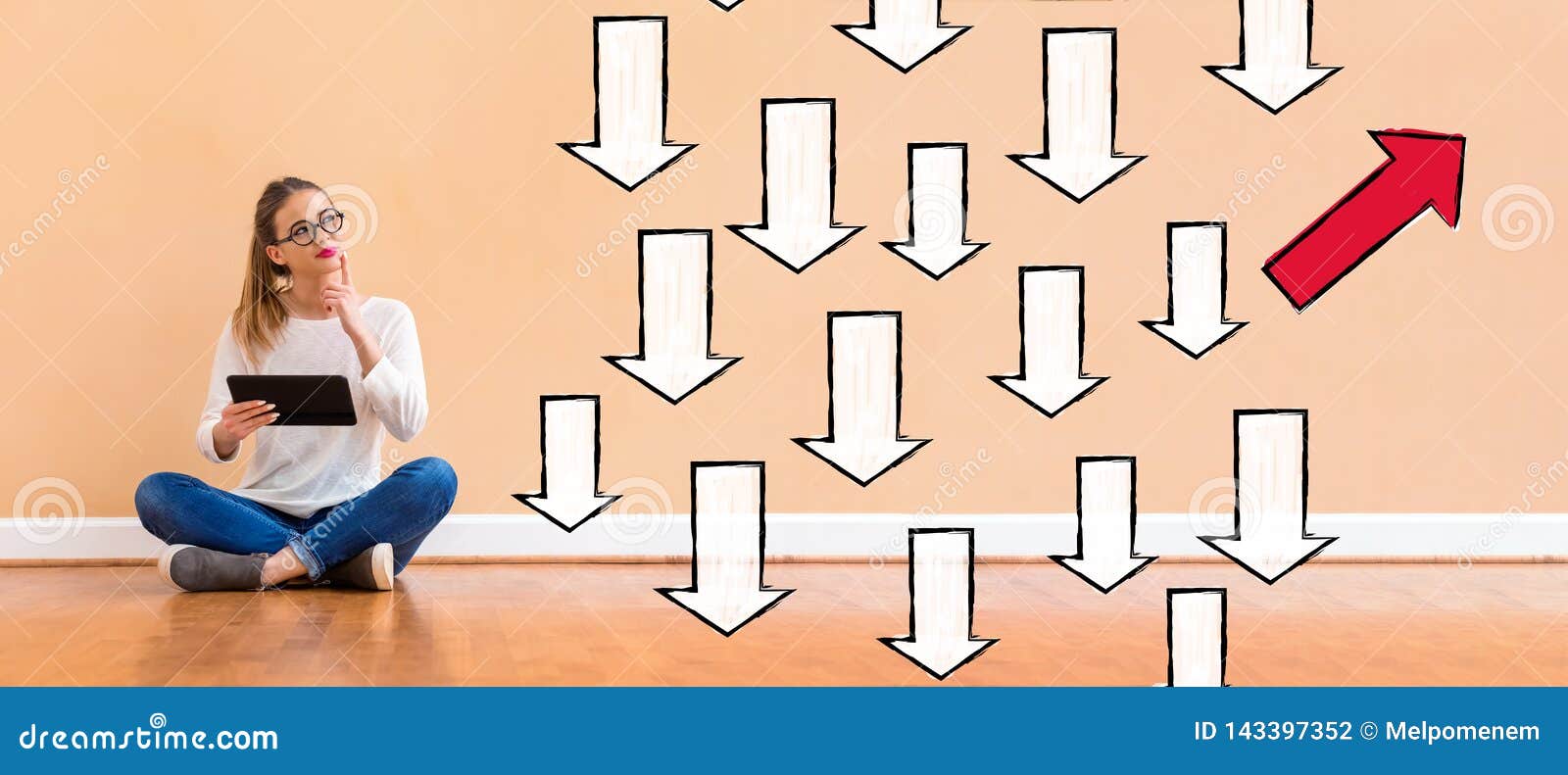 Arrow Going in a Different Direction with Woman Using a Tablet Stock ...