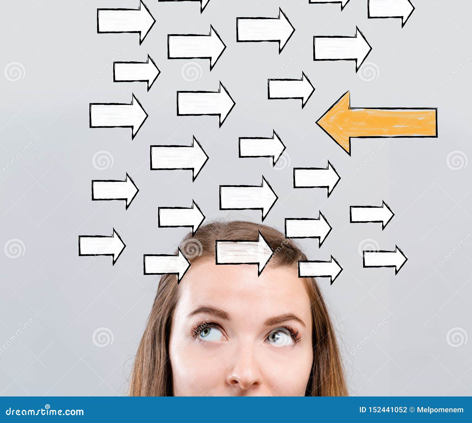 Arrow Going in the Opposite Direction with Young Woman Stock Photo ...