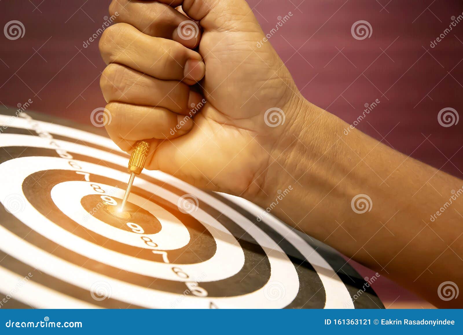 Arrow Hitting in the Target Center of Bullseye Stock Image - Image of ...