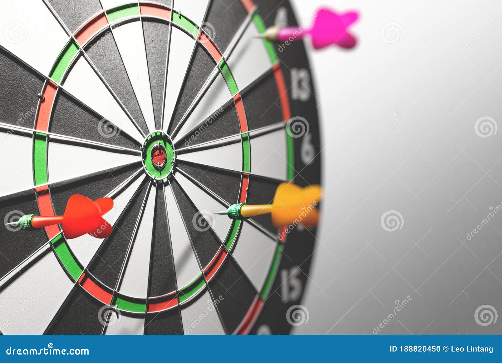 Darts Missing Bullseye On A Worn Out Dartboard. Proper Targeting ...