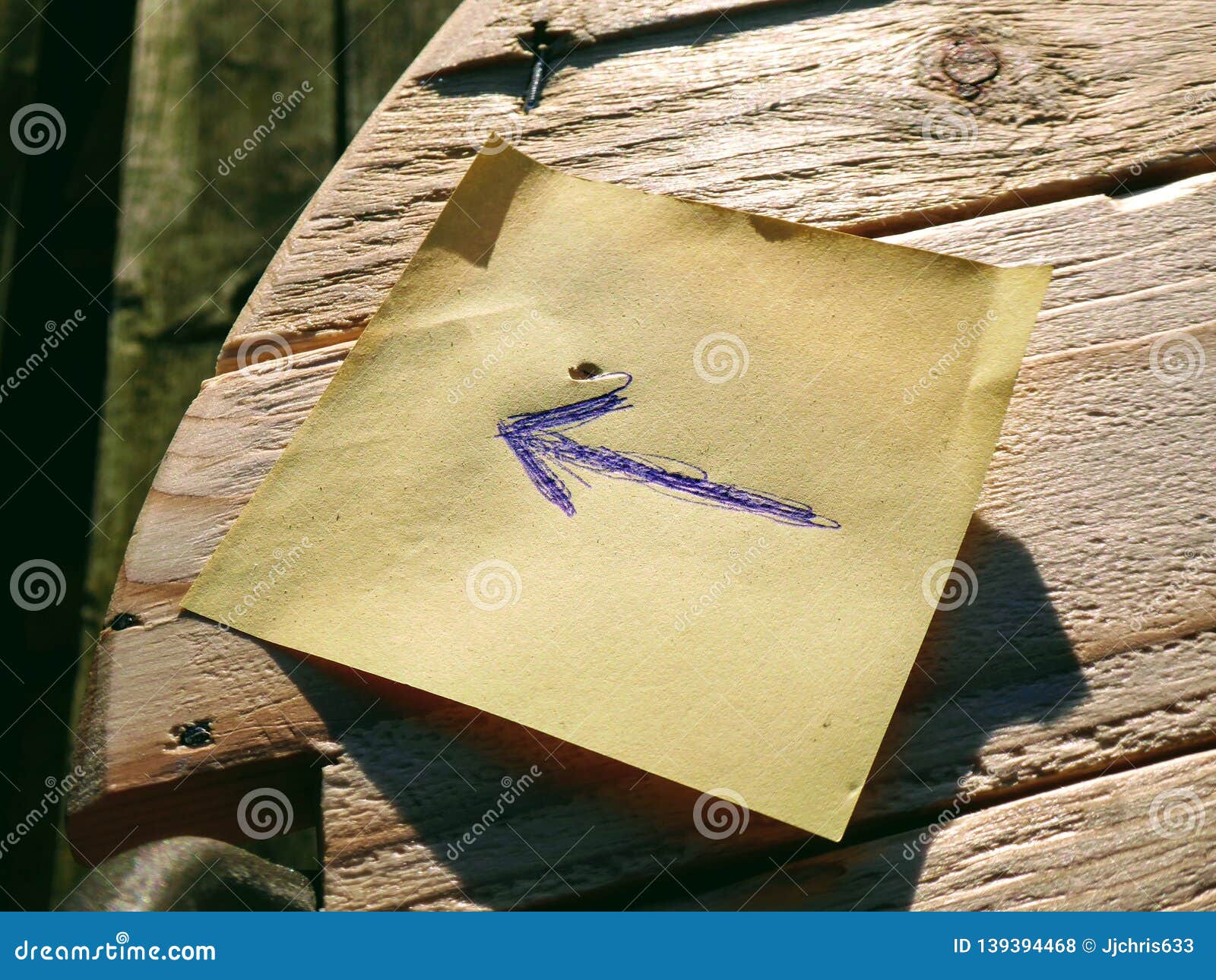 Arrow on note. that way. stock photo. Image of left - 139394468