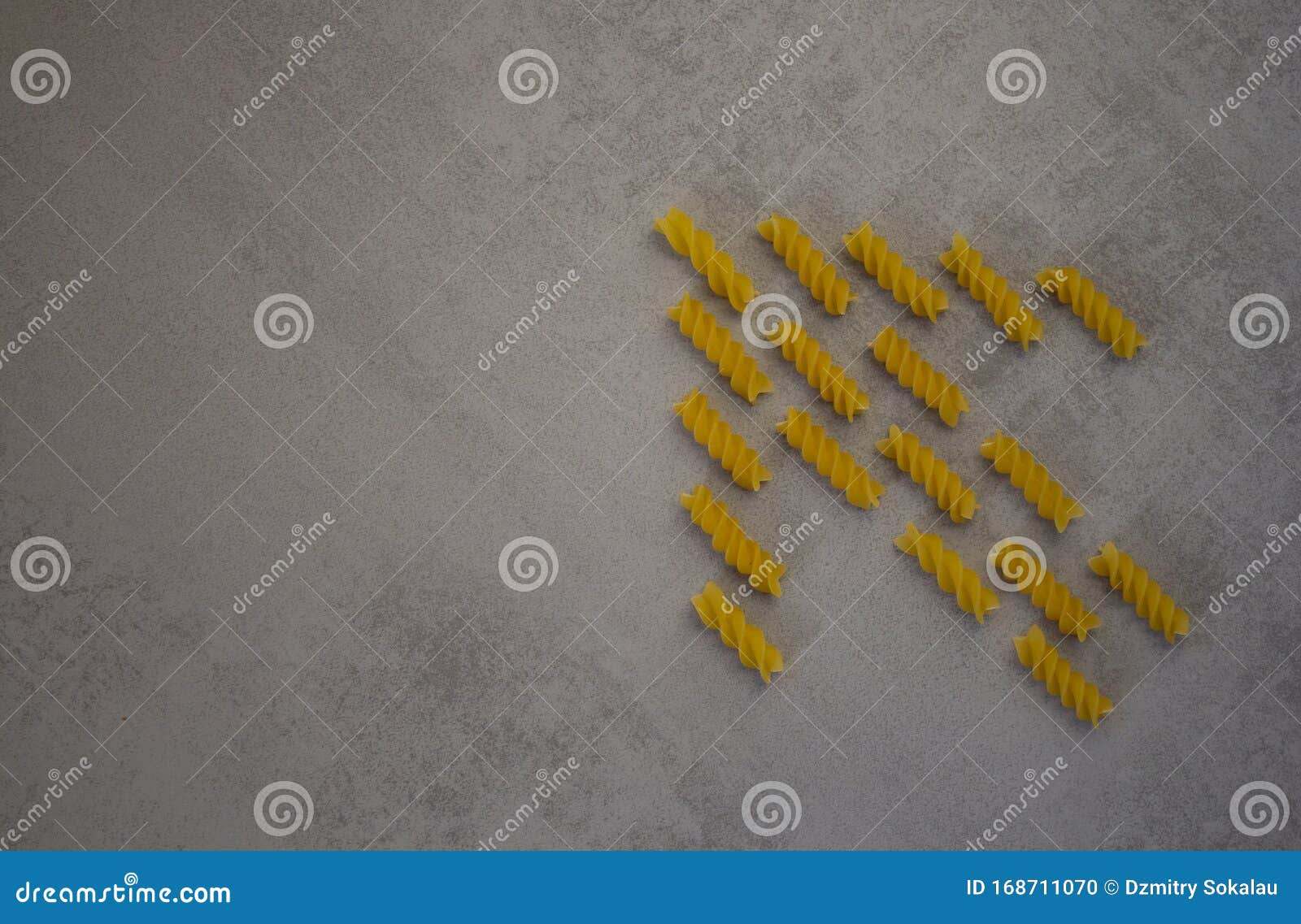 Arrow of Pasta on a Blue Background Stock Photo - Image of graphic ...