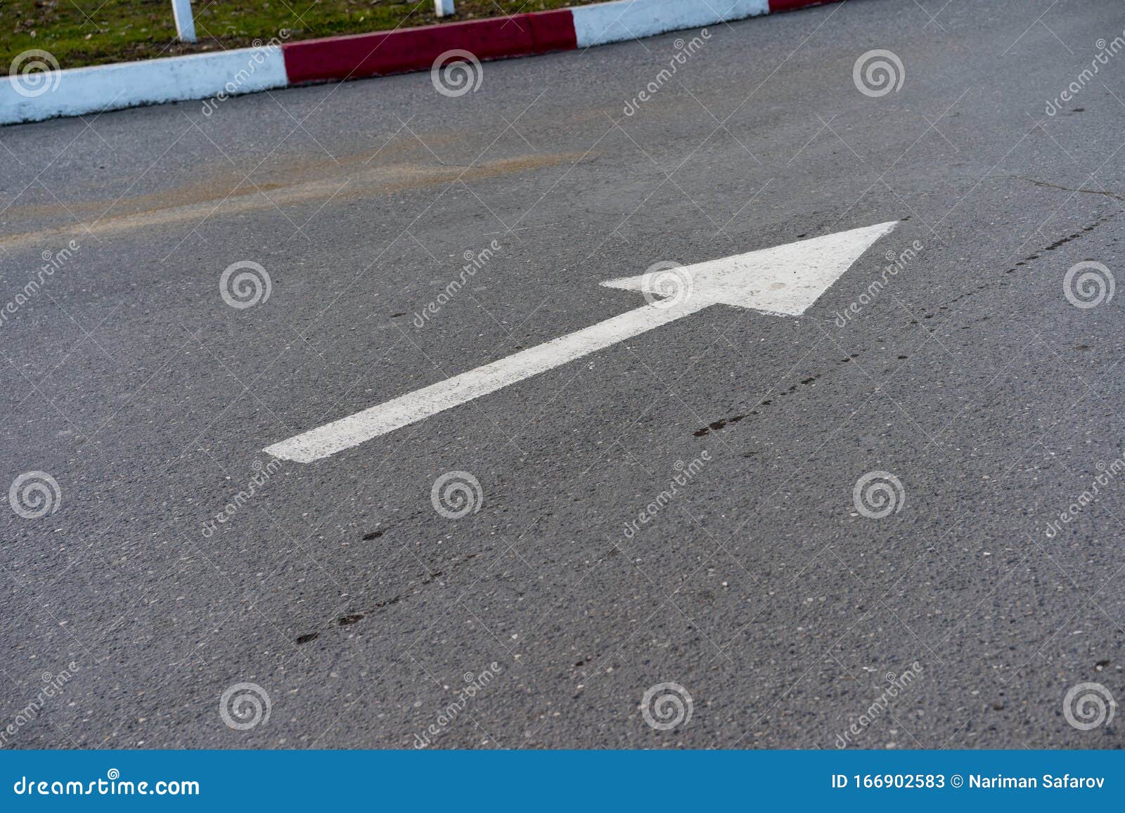 The Arrow on the Pavement Showing the Direction of Movement of Cars ...