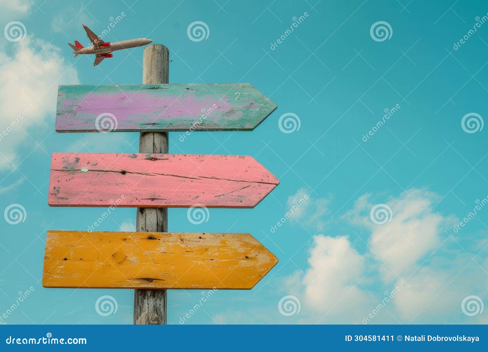 An Arrow on a Post Pointing To Different Destinations Stock Image ...