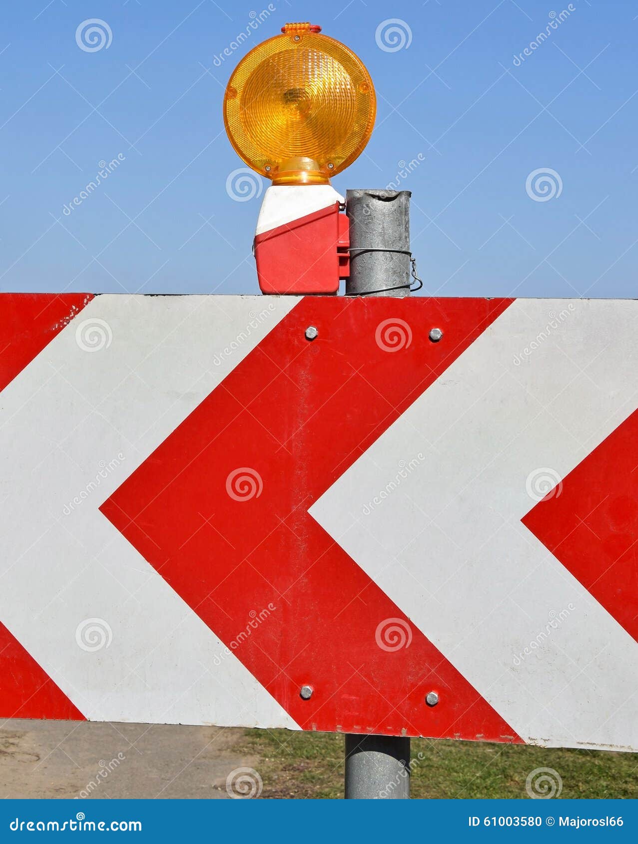 Arrow Road Sign with Amber Light Stock Photo - Image of ideas, city ...