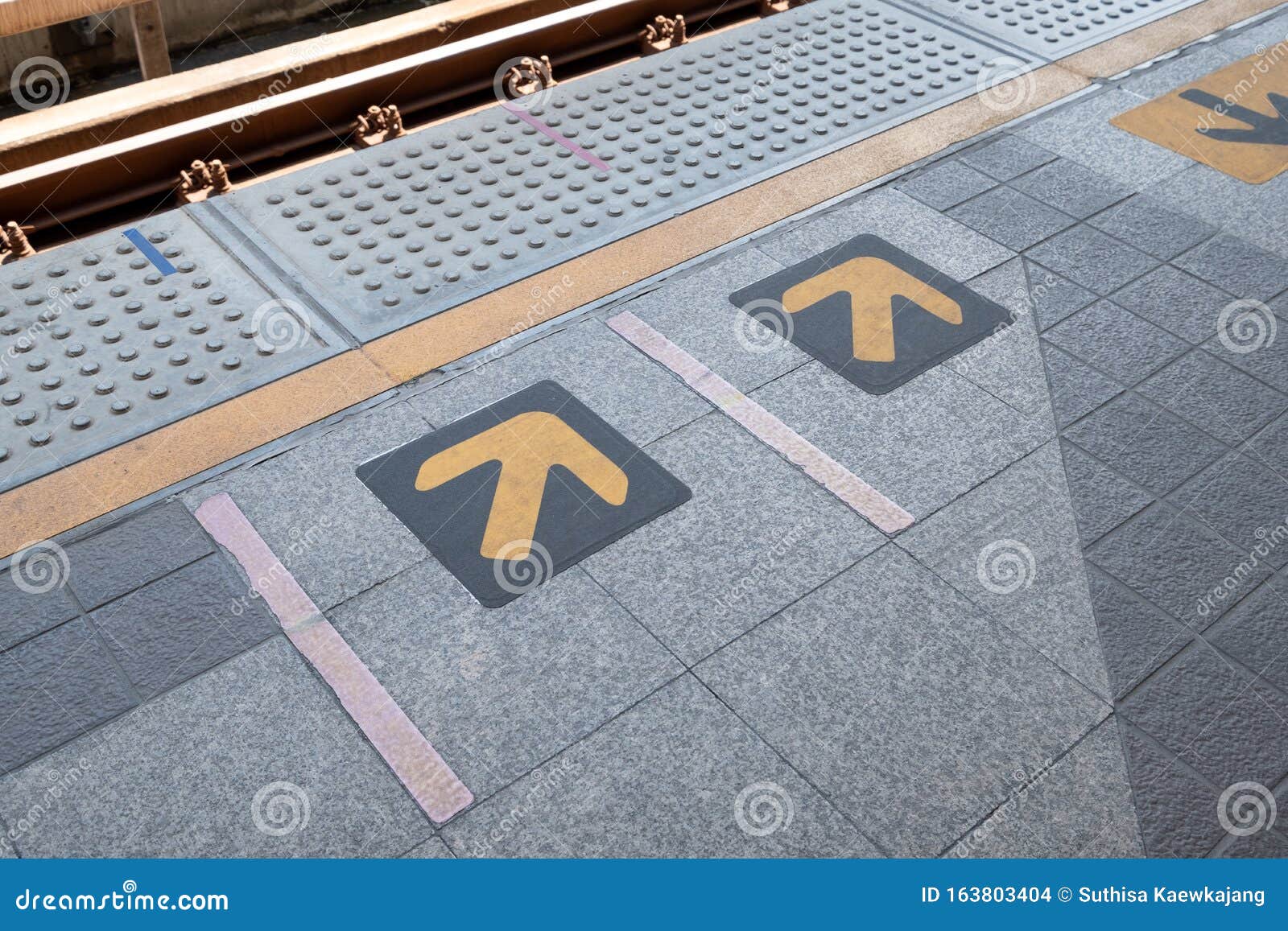 Arrow Sign at Electric Train Station Stock Photo - Image of mode, icon ...