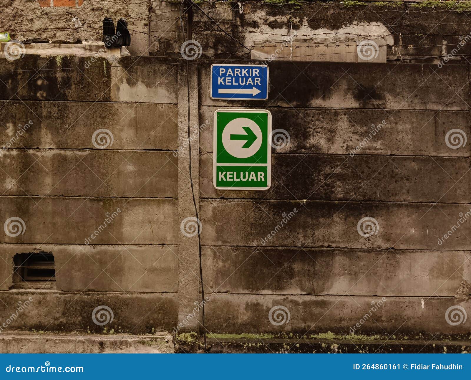 An Arrow Sign for Keluar Which Means Exit Stock Image - Image of exit ...