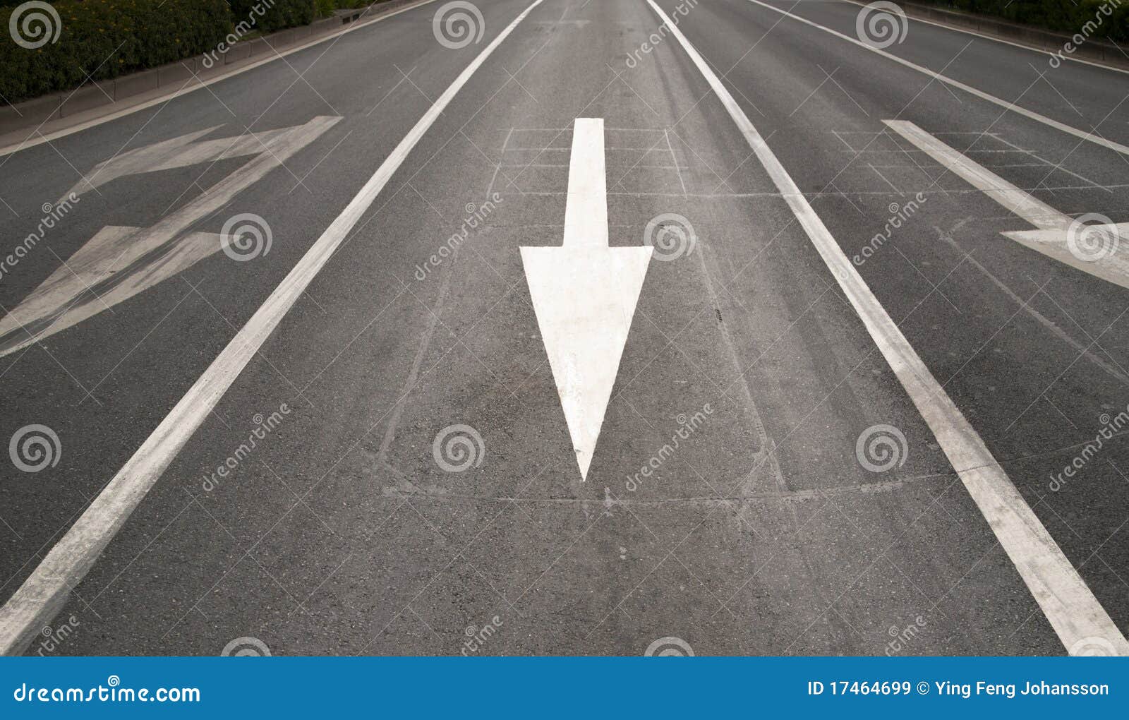 Arrow sign on road stock image. Image of guide, highway - 17464699