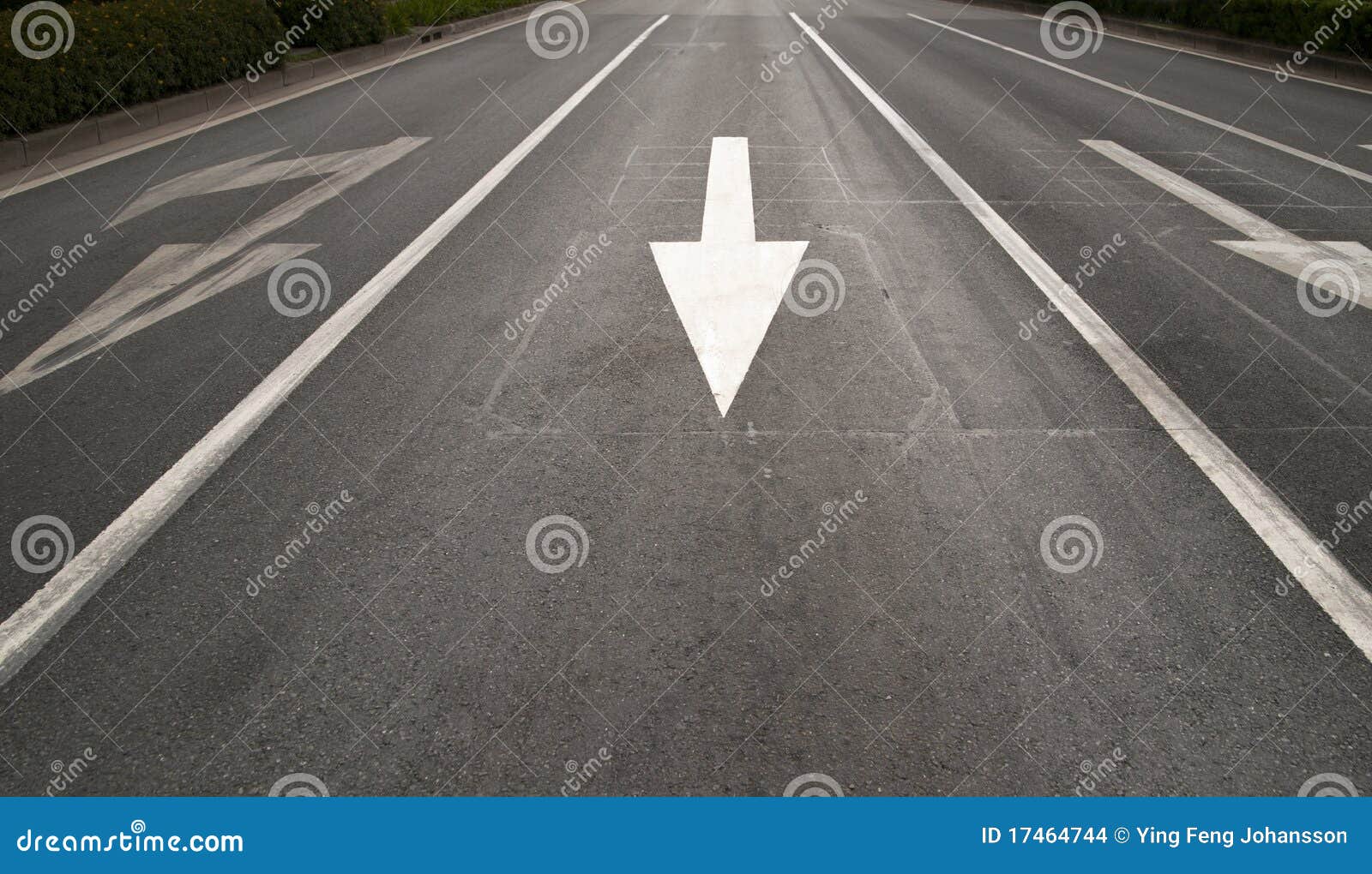 Arrow sign on road stock photo. Image of direction, arrow - 17464744