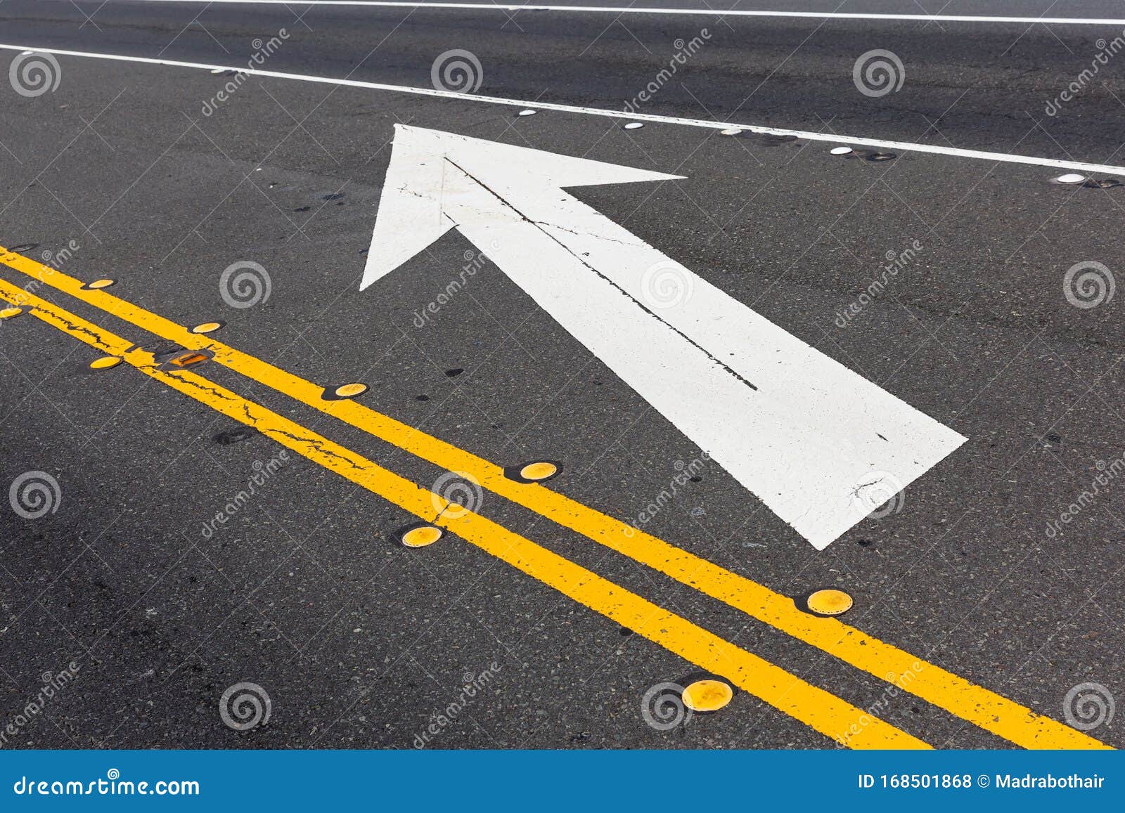 Arrow sign on a road stock photo. Image of arrow, street - 168501868