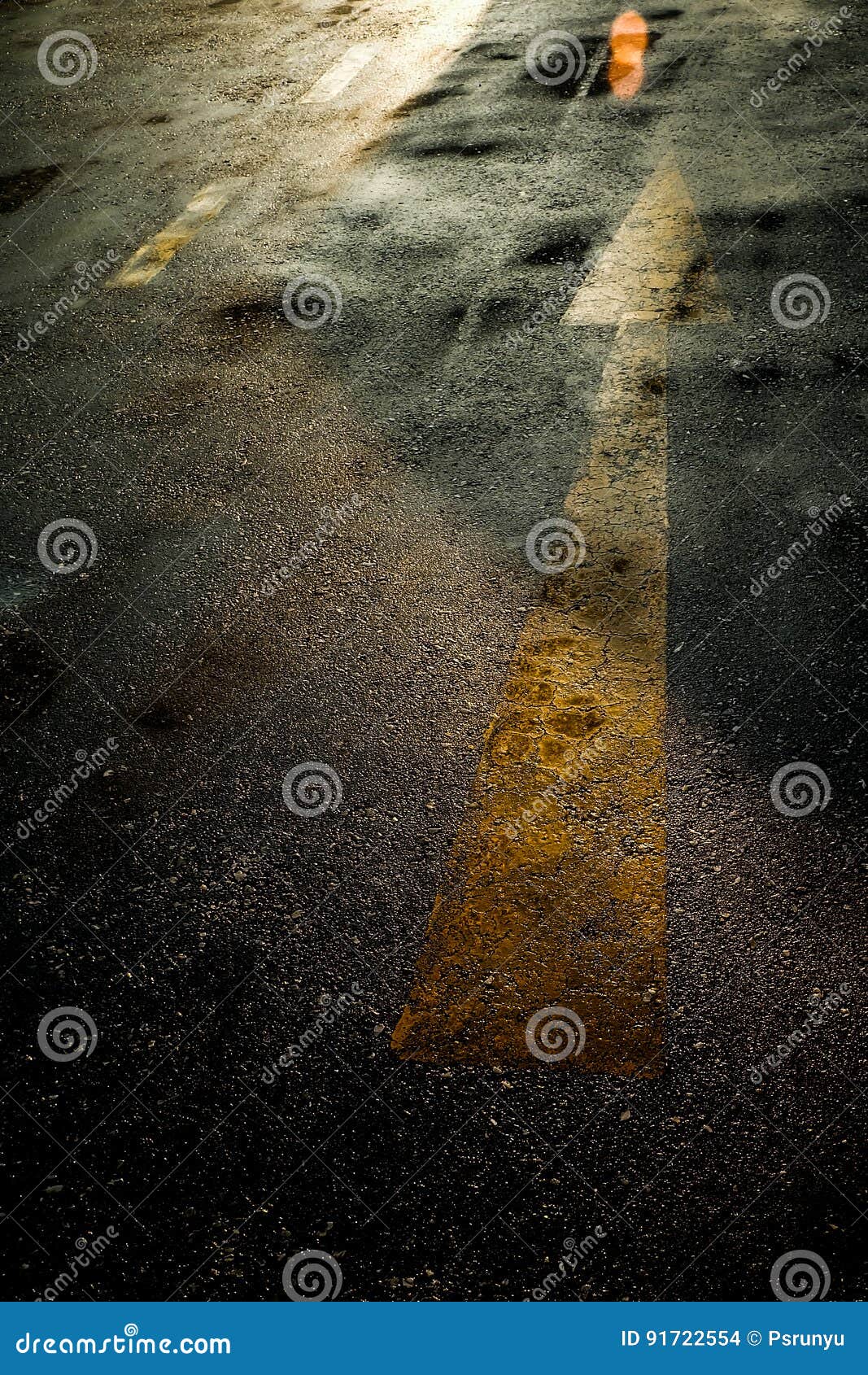 Arrow Sign on the Road after Raining Stock Photo - Image of lane ...