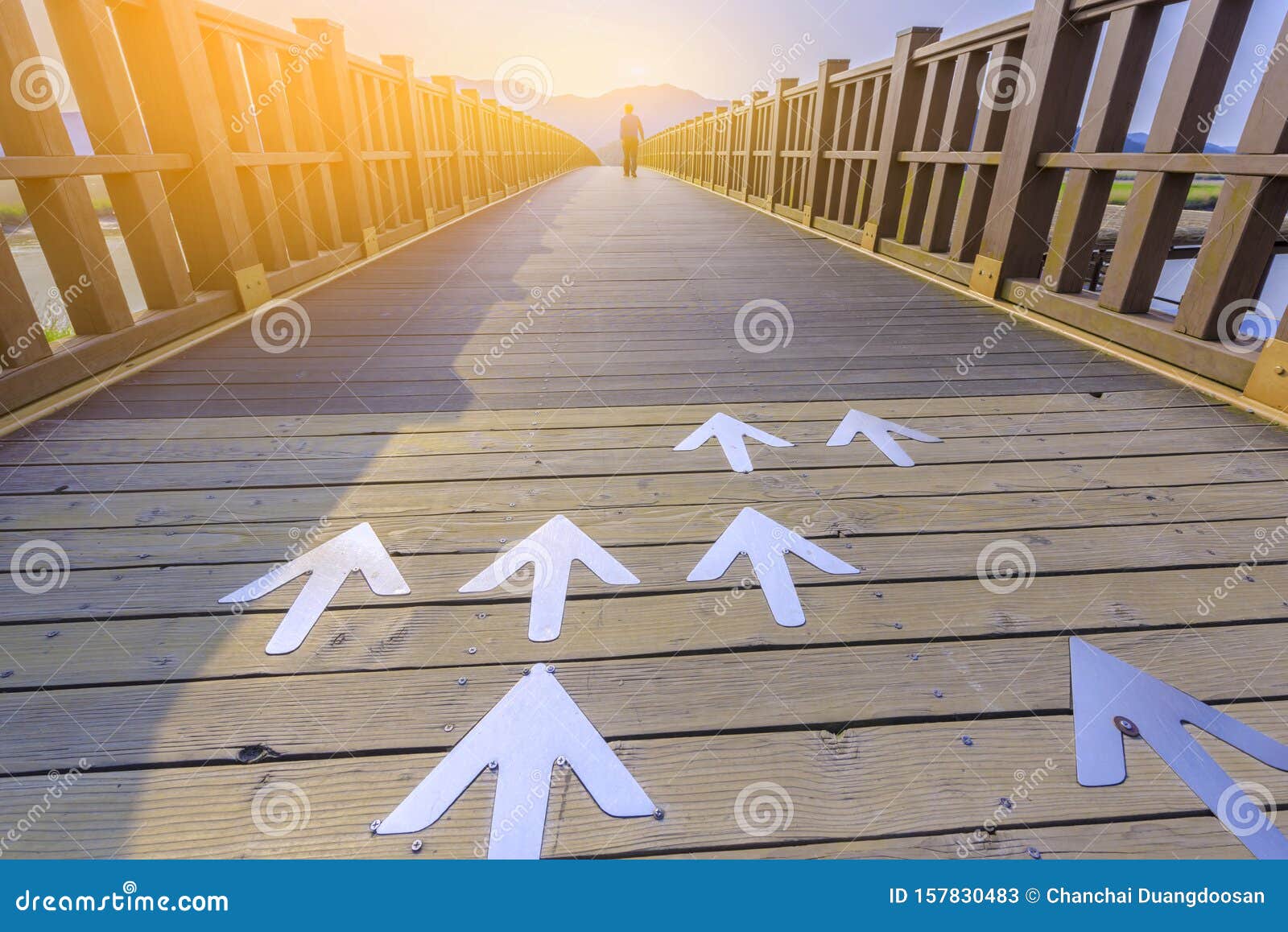 Arrow Sign and Wood Walkway Stock Image - Image of bridge, direction ...