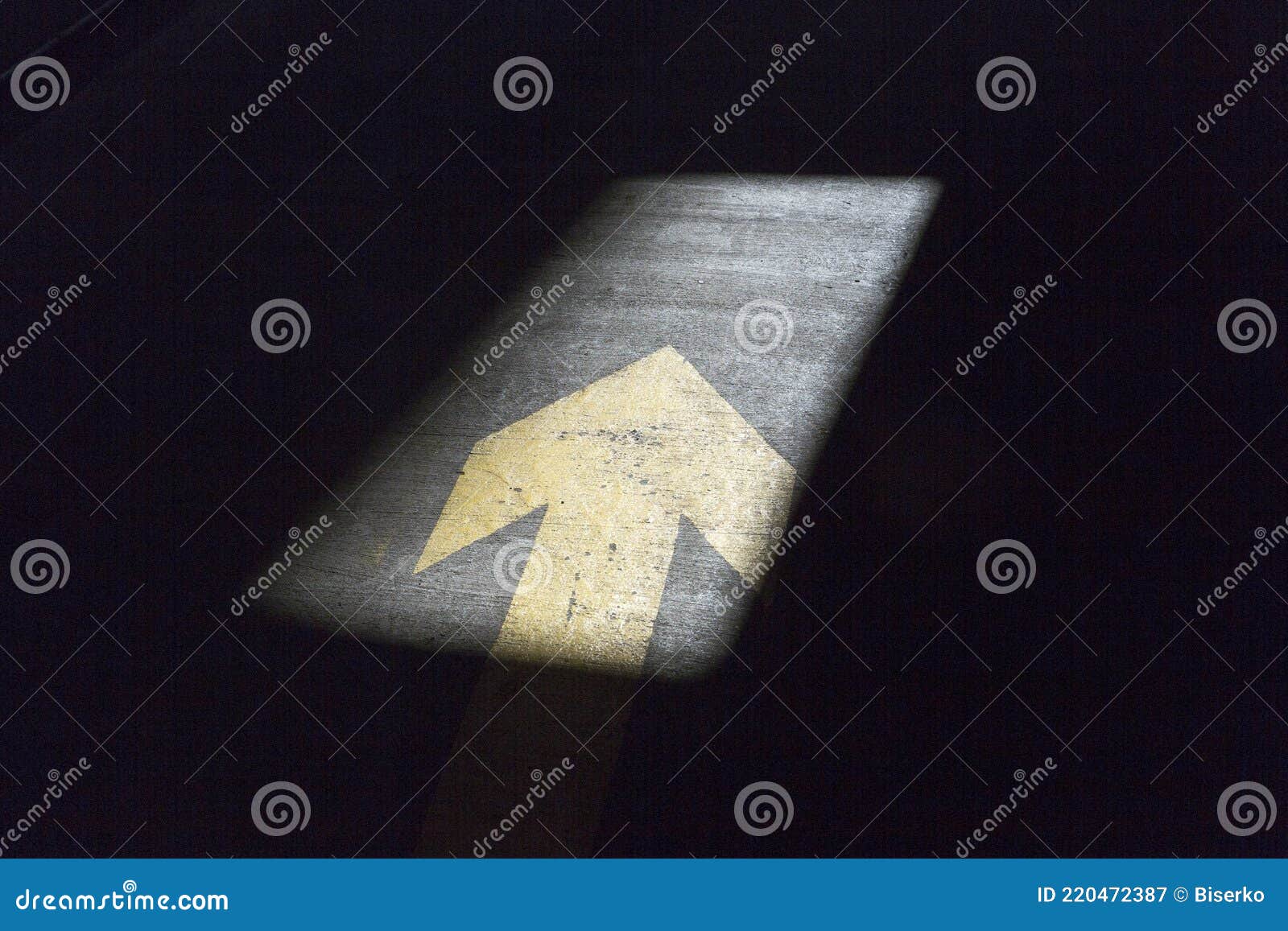 Arrow on the street stock image. Image of street, danger - 220472387