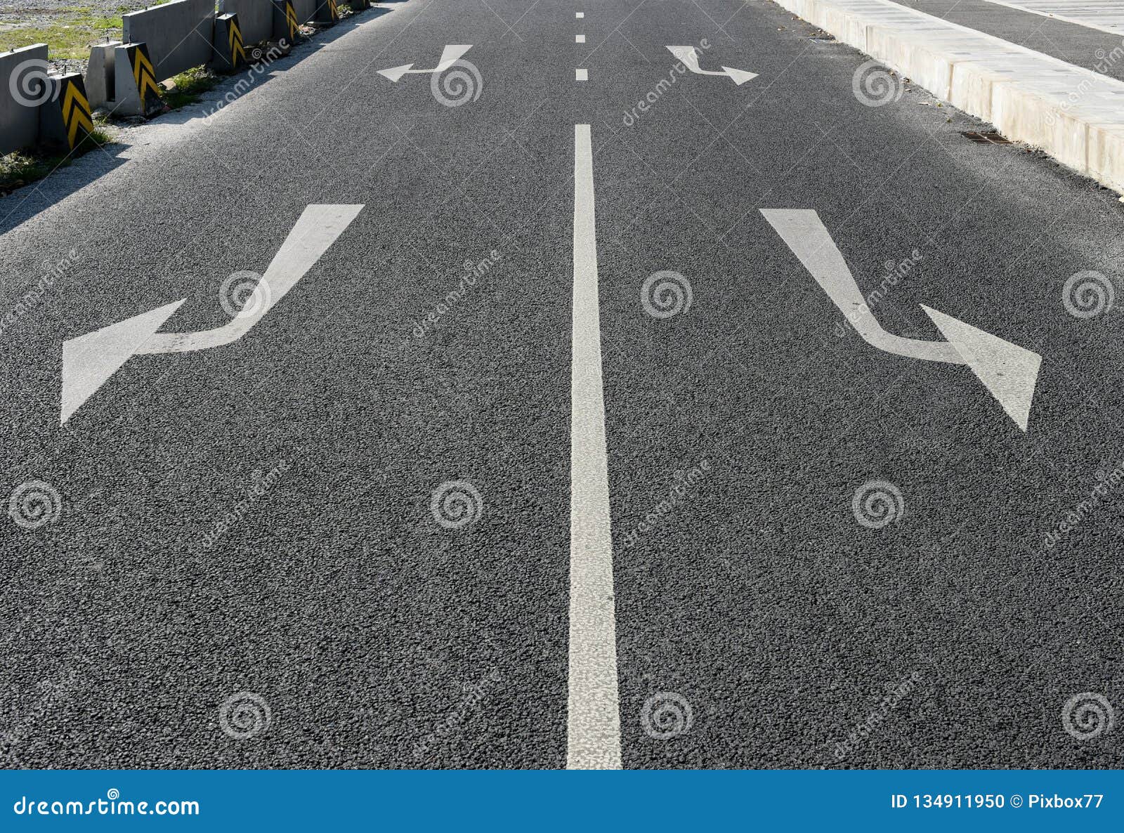 Arrow traffic sign on road stock photo. Image of traffic - 134911950