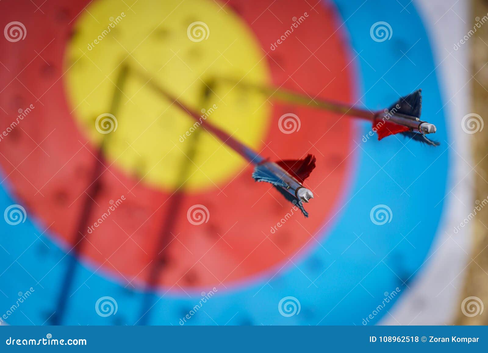Arrows in archery target stock photo. Image of arrows - 108962518