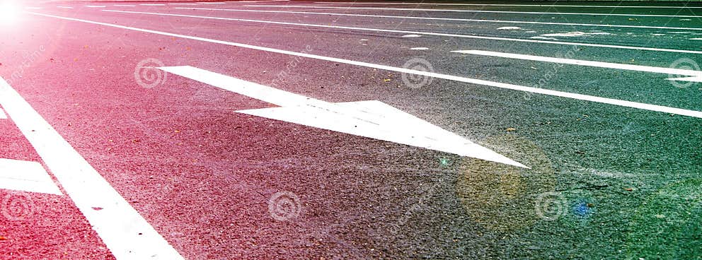 Arrows on the Asphalt To Indicate the Direction of Driving Stock Image ...