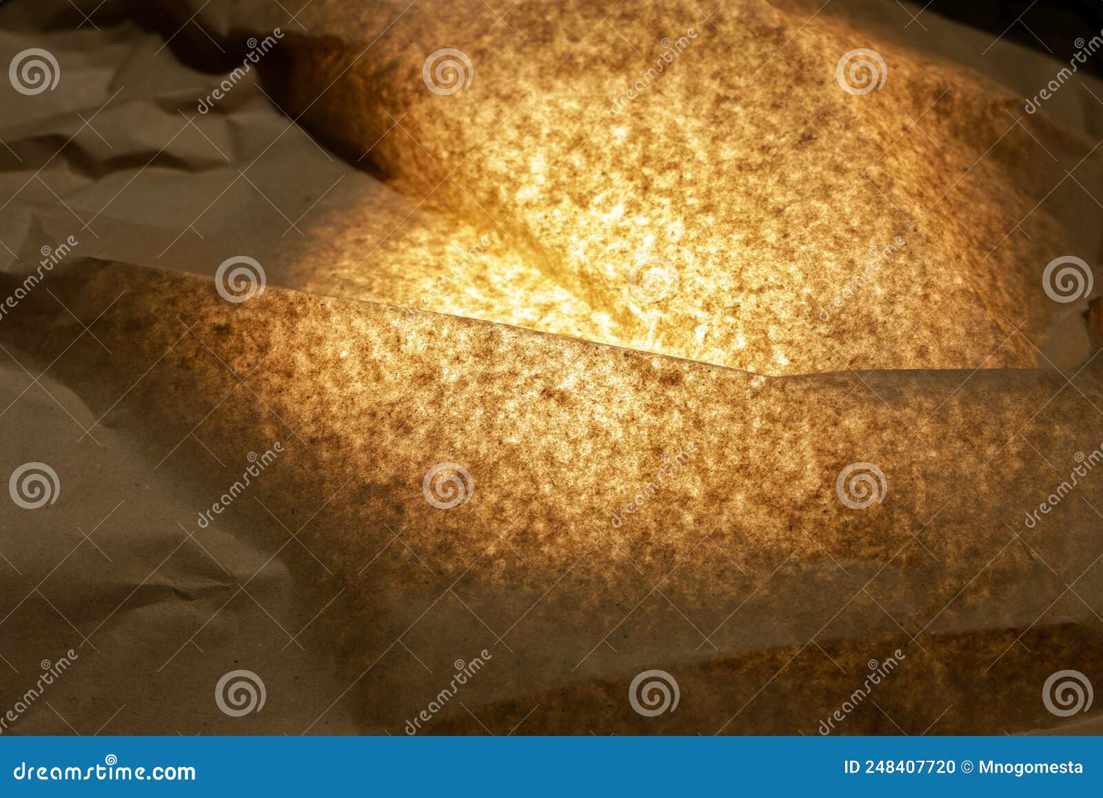 Art Concept. Crumpled Craft Paper Illuminated by a Lamp from the Inside ...