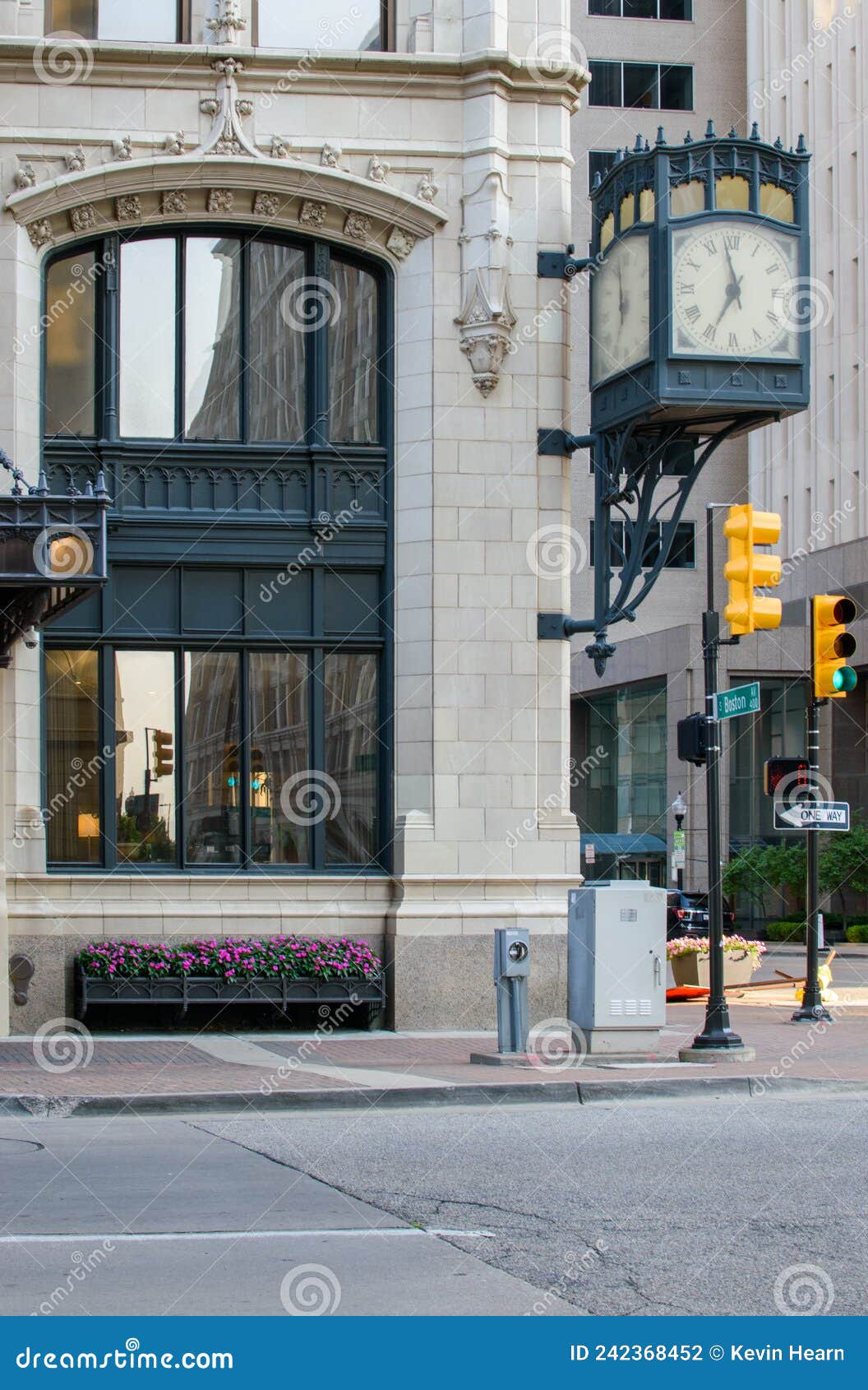 Downtown Building with Clock Stock Photo - Image of intersection ...