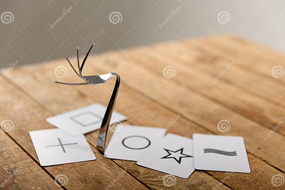 Art of Fork Bending, How To Bend Forks with Your Mind Stock Image ...