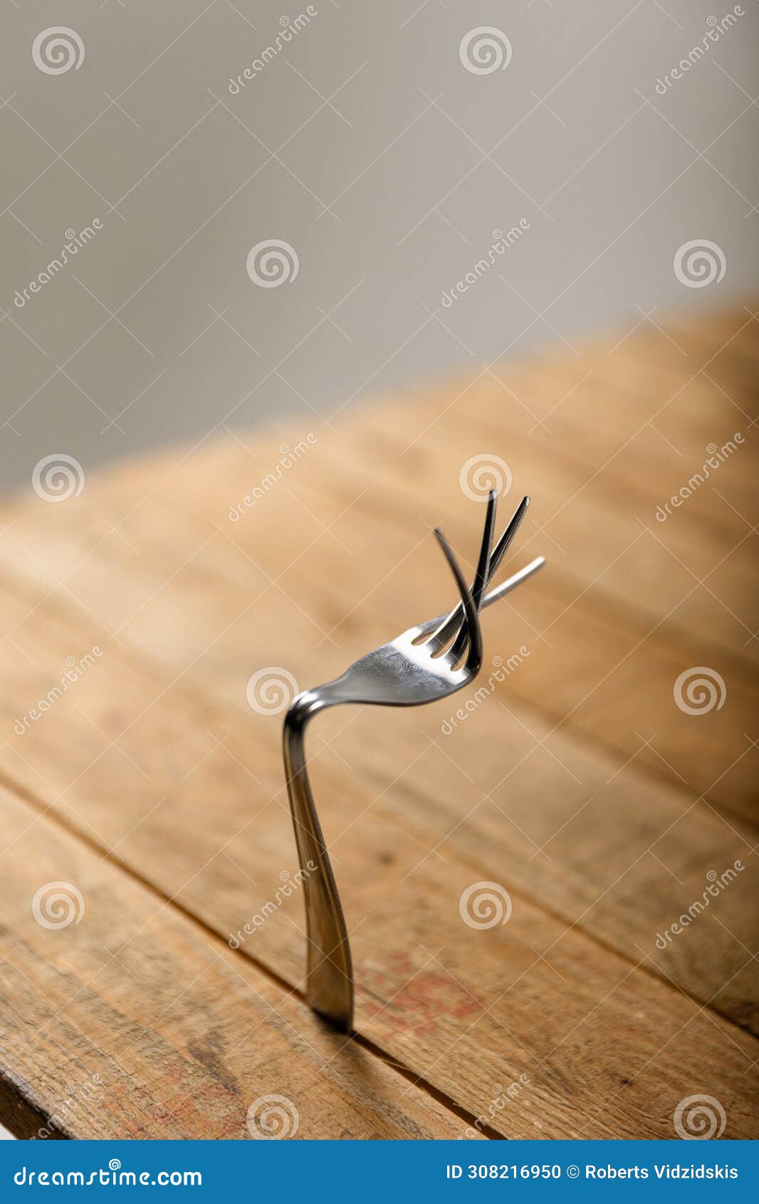 Art of Fork Bending, How To Bend Forks with Your Mind Stock Photo ...