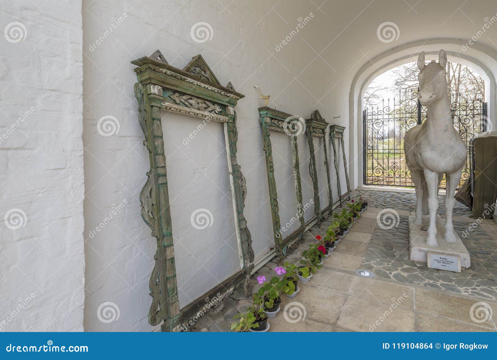 Art and Sculpture Workshop with a Statue of a Horse and Frames ...