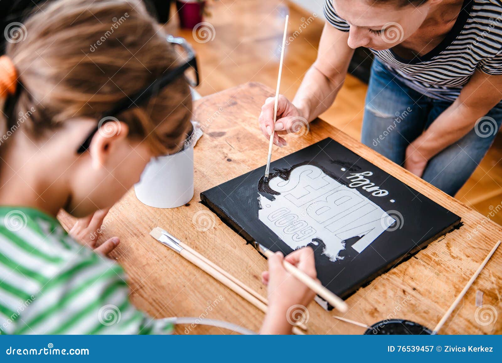 Art Teacher Helping a Student with Painting Stock Image - Image of help ...